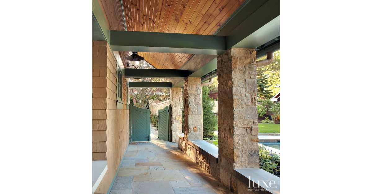 Traditional Neutral Covered Walkway with Green Doors - Luxe Interiors ...