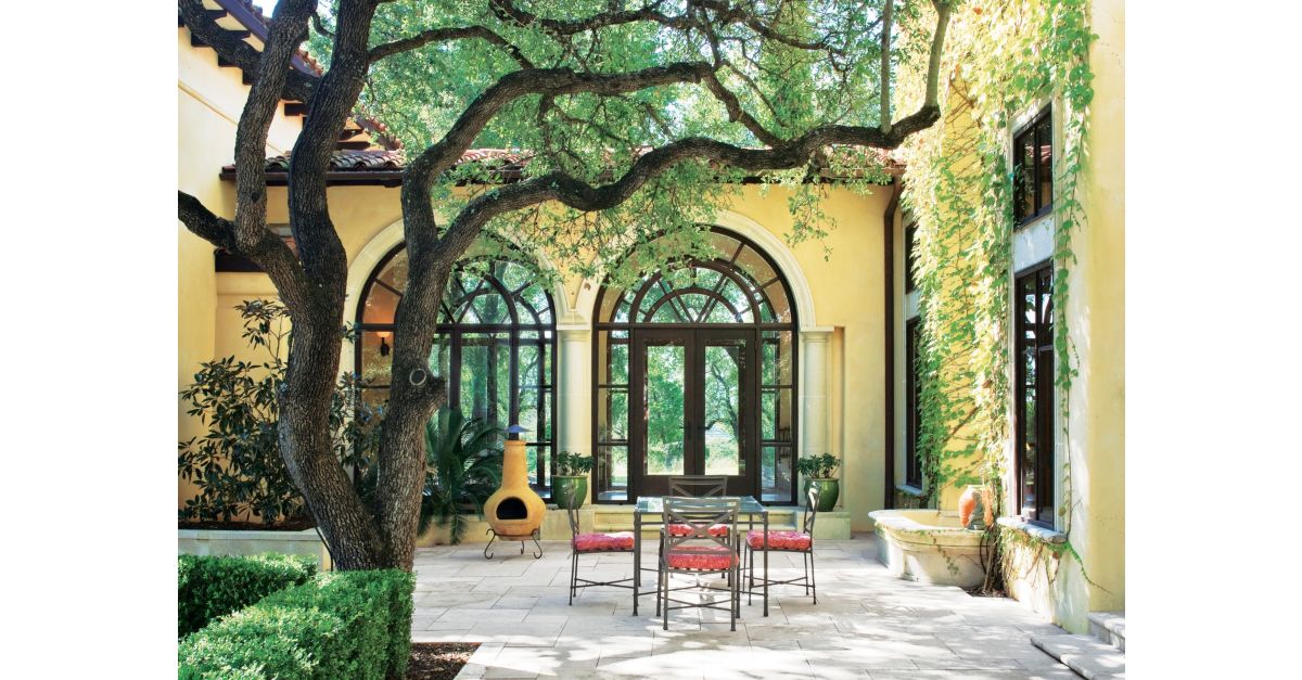Yellow Italian Style Courtyard - Luxe Interiors + Design